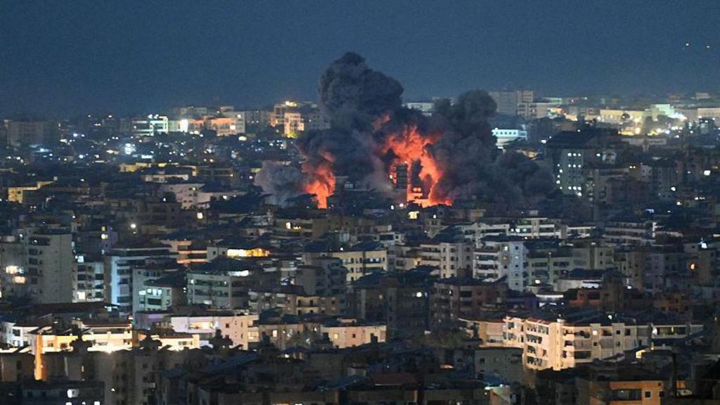 Israel launches new attacks on Tehran and Beirut, as US embassy in ...
